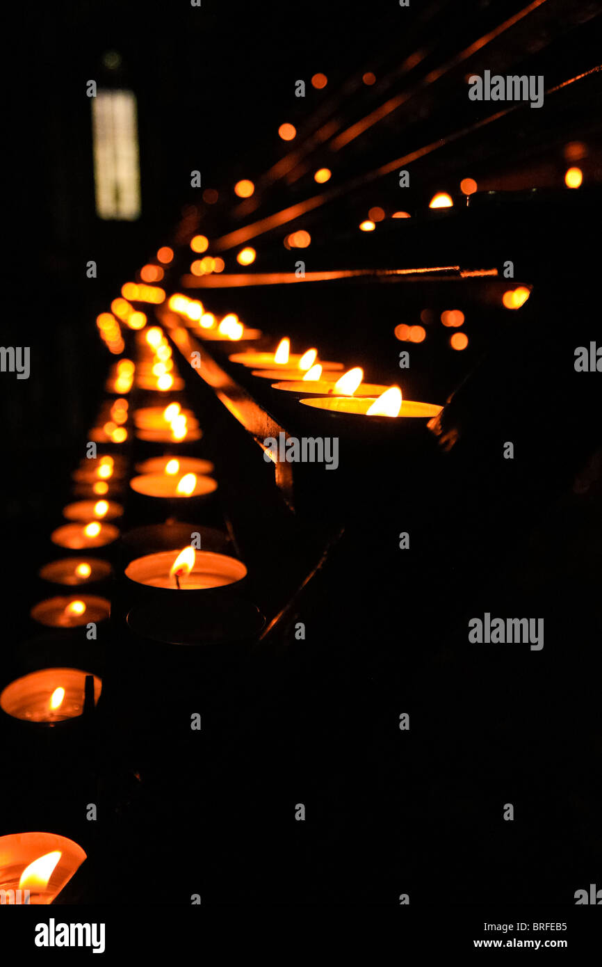 Stack lit candles in hi-res stock photography and images - Alamy
