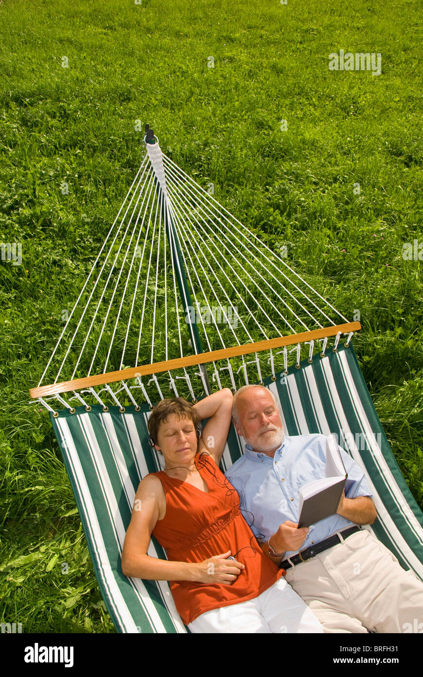 Two people in hammocks hi-res stock photography and images - Alamy