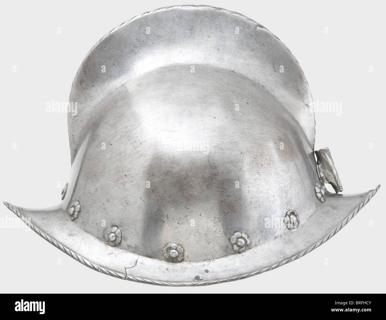 A German morion,circa 1580. Heavy skull,forged in one piece with a high ...