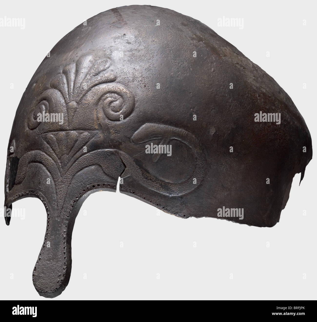 A Corinthian helmet(fragment),6th/5th century B.C.Bronze.The nasal and ...