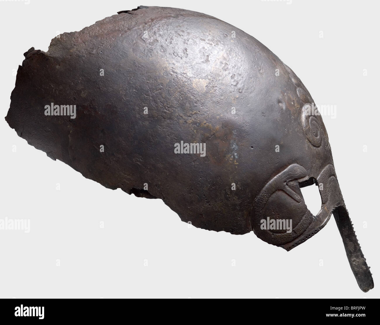 A Corinthian helmet(fragment),6th/5th century B.C.Bronze.The nasal and ...