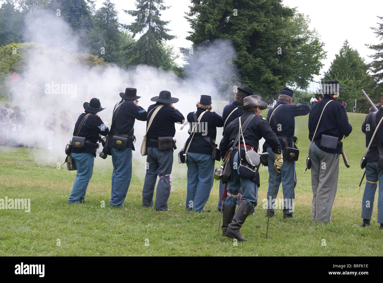 Union infantry line firing a volley, Civil War Battle Re-enactment ...