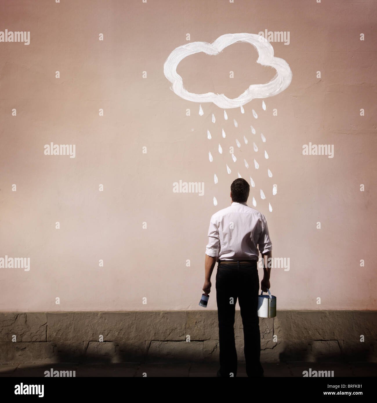 man with rain cloud painted on a wall Stock Photo - Alamy