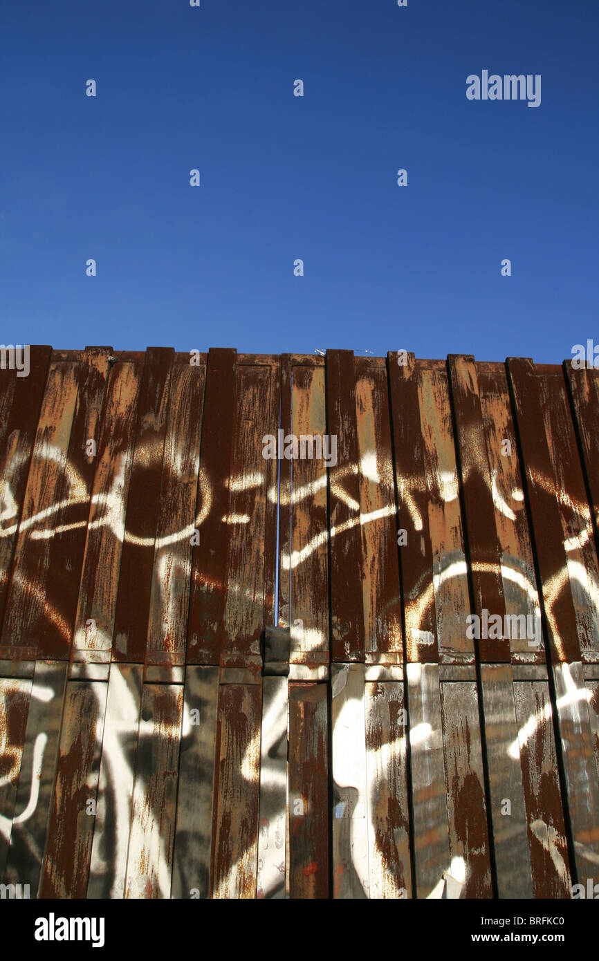 high rusted metal wall in sun Stock Photo - Alamy