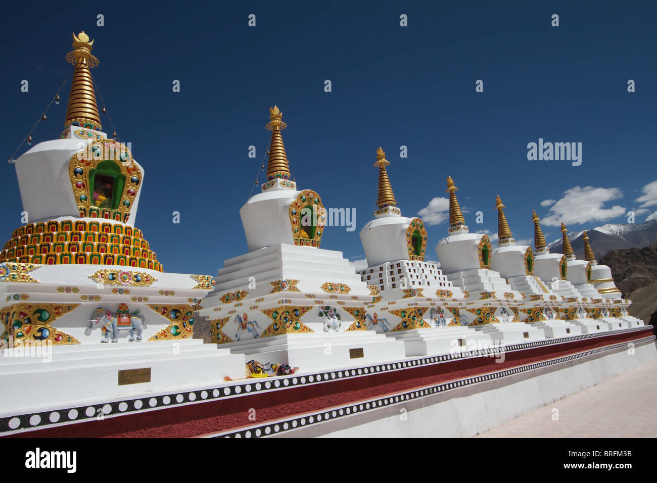 line of white chortens in the thiksey gompa Stock Photo - Alamy
