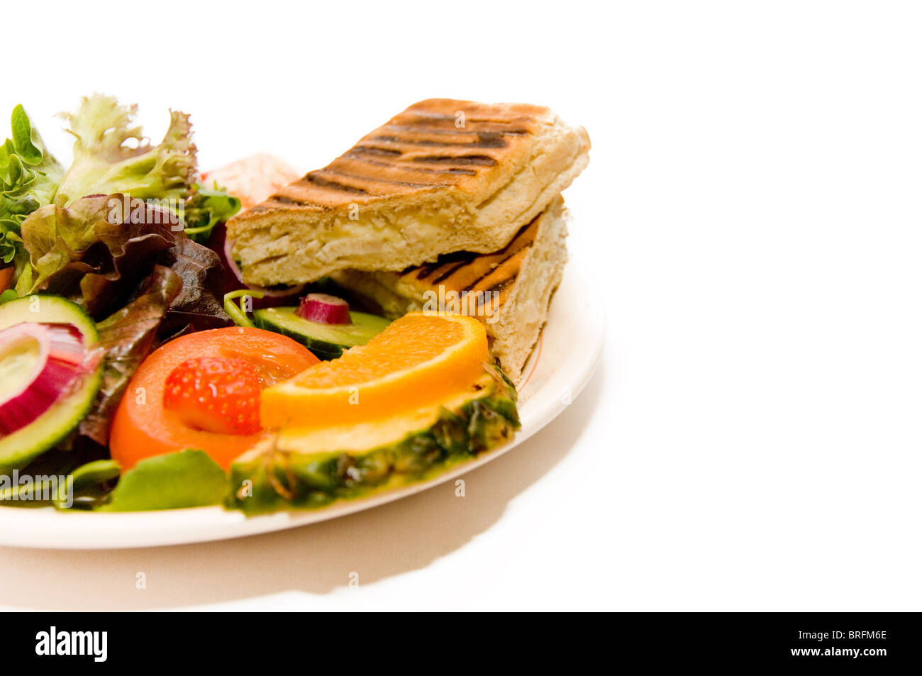 Chicken Melt Panini with salad Stock Photo - Alamy