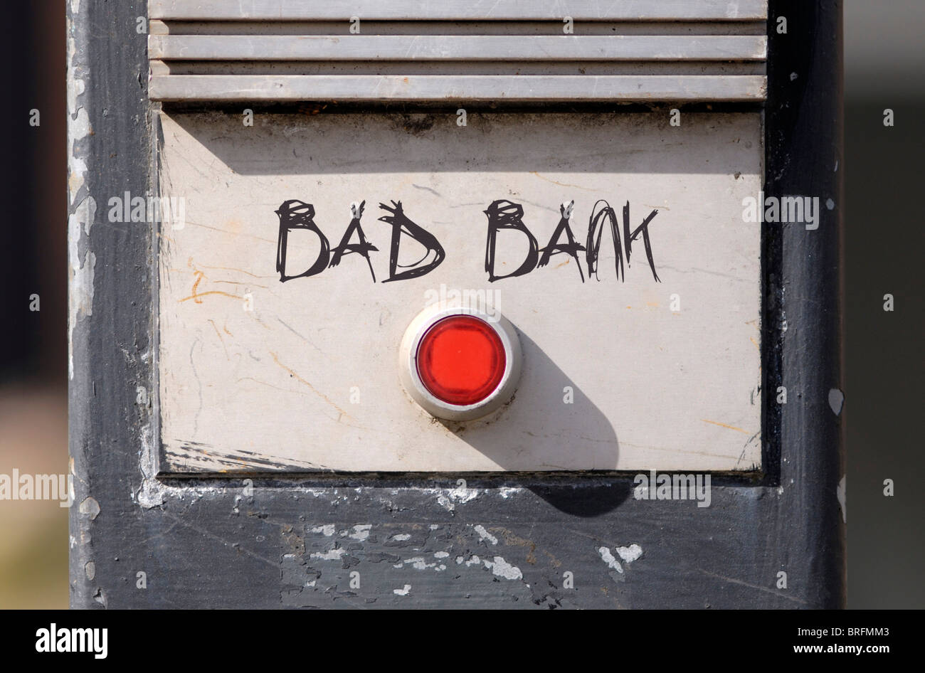 Red doorbell, Bad Bank written above it Stock Photo - Alamy