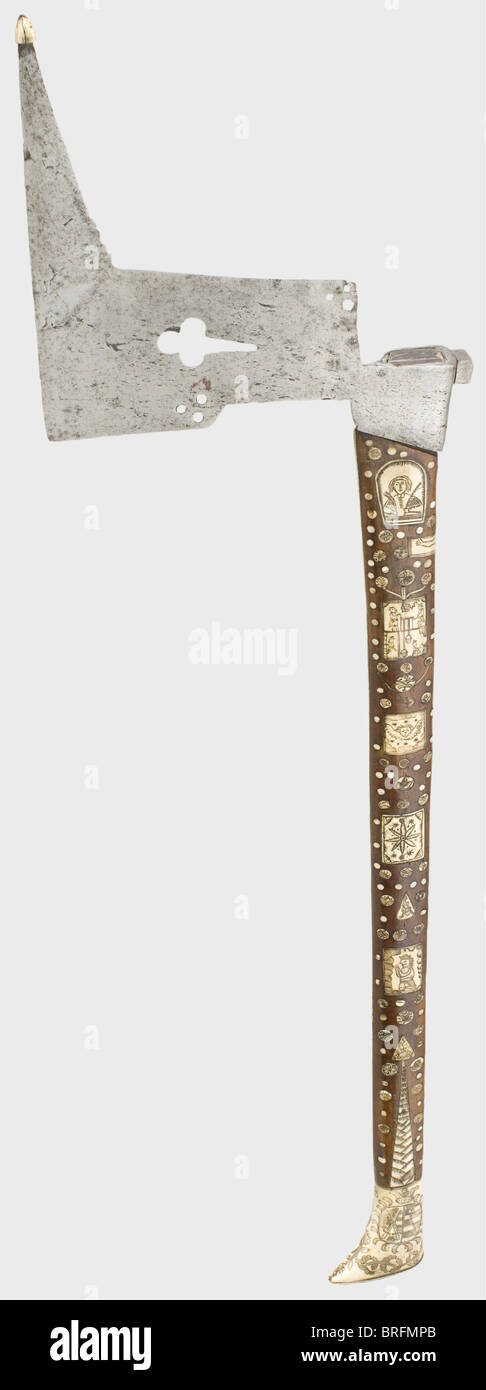 A Saxon miner's axe,dated 1702. Openwork,iron blade. The blade point ...