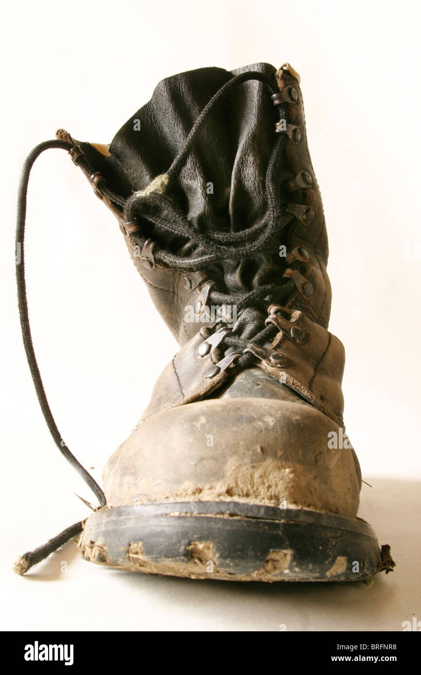 dirty leather boots Stock Photo - Alamy