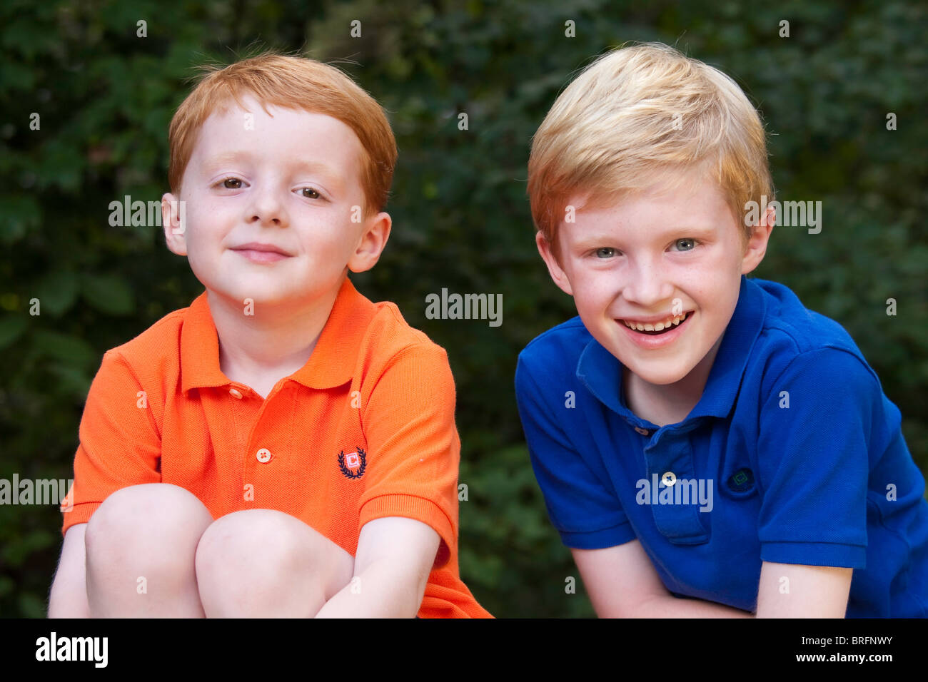 Brothers Smiling at Camera, USA Stock Photo - Alamy