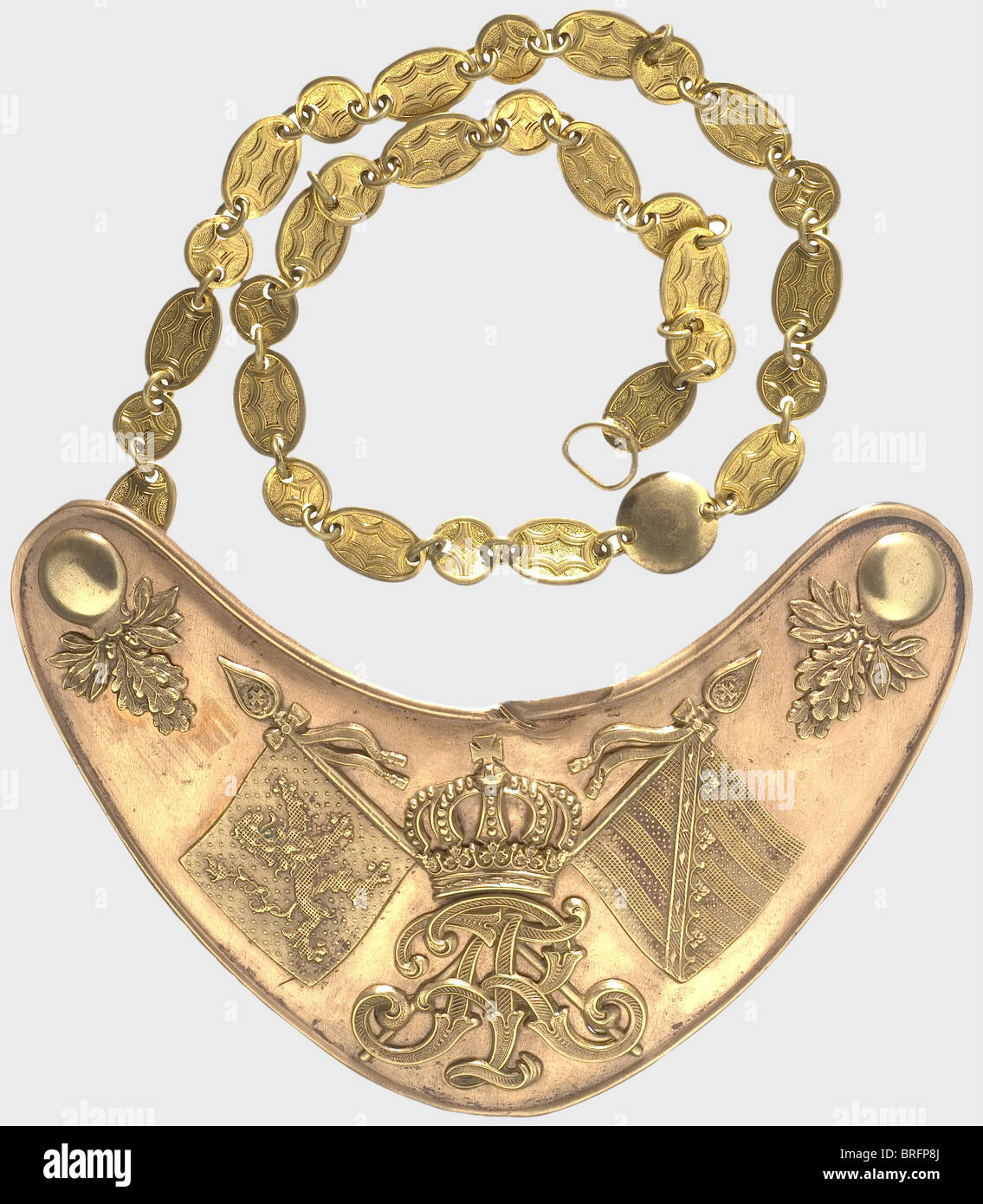 A gorget for guidon bearers.,Kidney-shaped,tombac shield bearing a ...