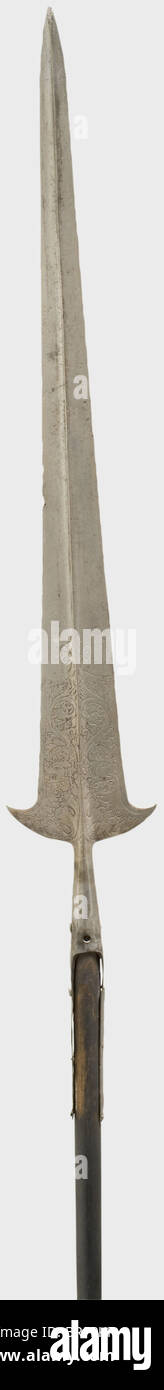 An etched Italian partisan, 16th century. Long double-edged blade with ...