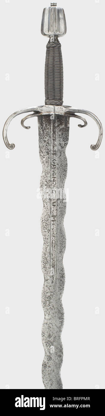 An Italian crab-hilt sword,circa 1630. A heavy,waved blade with fullers ...