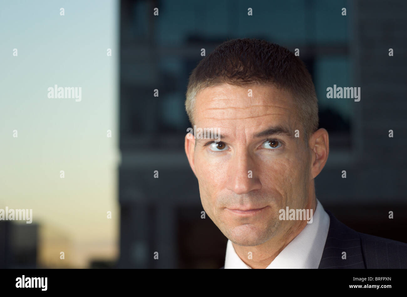 tough looking man in a suit, business concept Stock Photo - Alamy