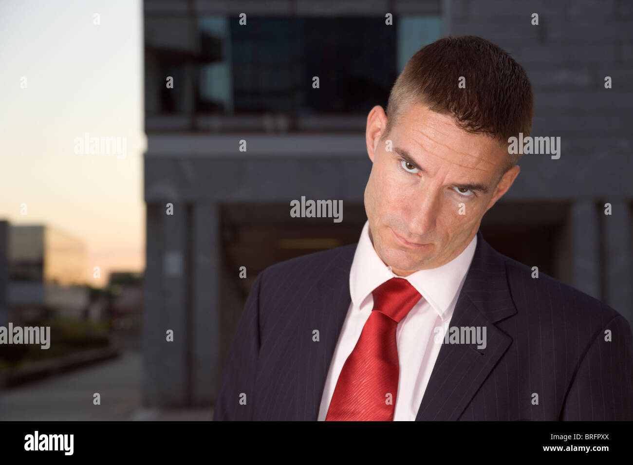 tough looking man in a suit, business concept Stock Photo - Alamy