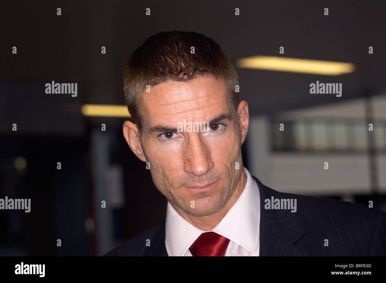tough looking man in a suit, business concept Stock Photo - Alamy