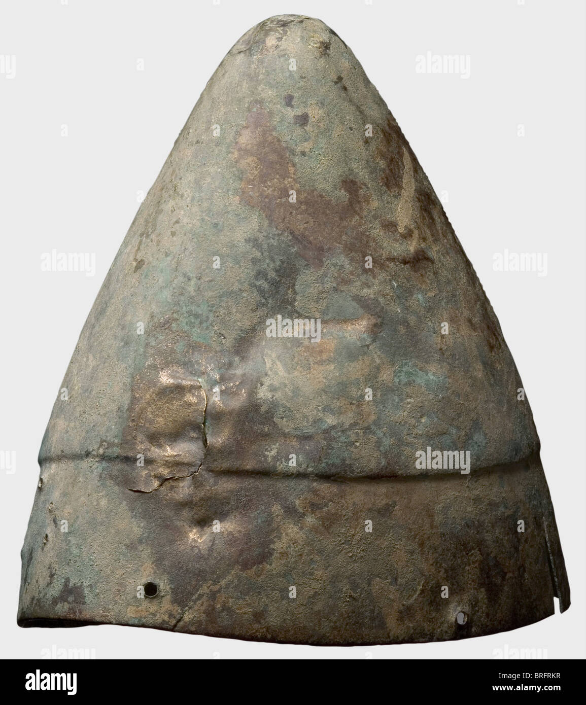 A Hellenistic pilos helmet,4th century B.C. Very tall,conical helmet ...