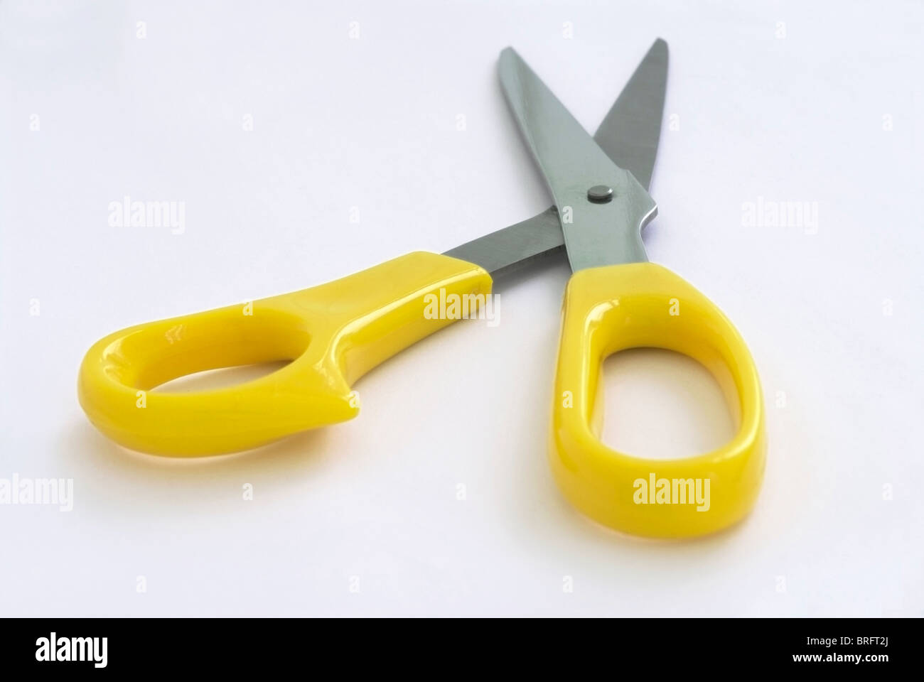 Yellow Handle Scissors Stock Photo - Alamy