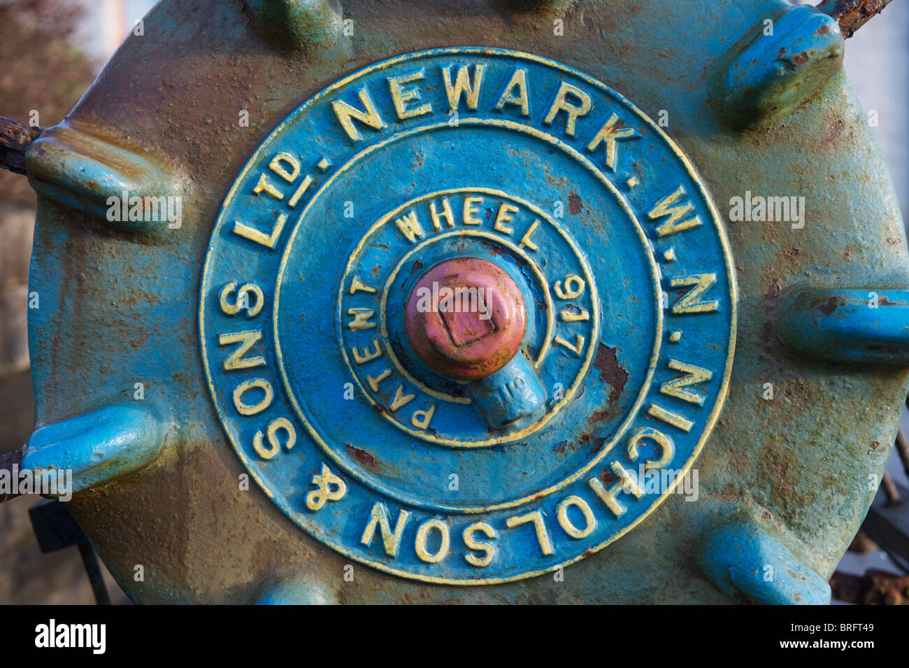 The rusted inside of a wheel on a piece of machinery at the quay in ...
