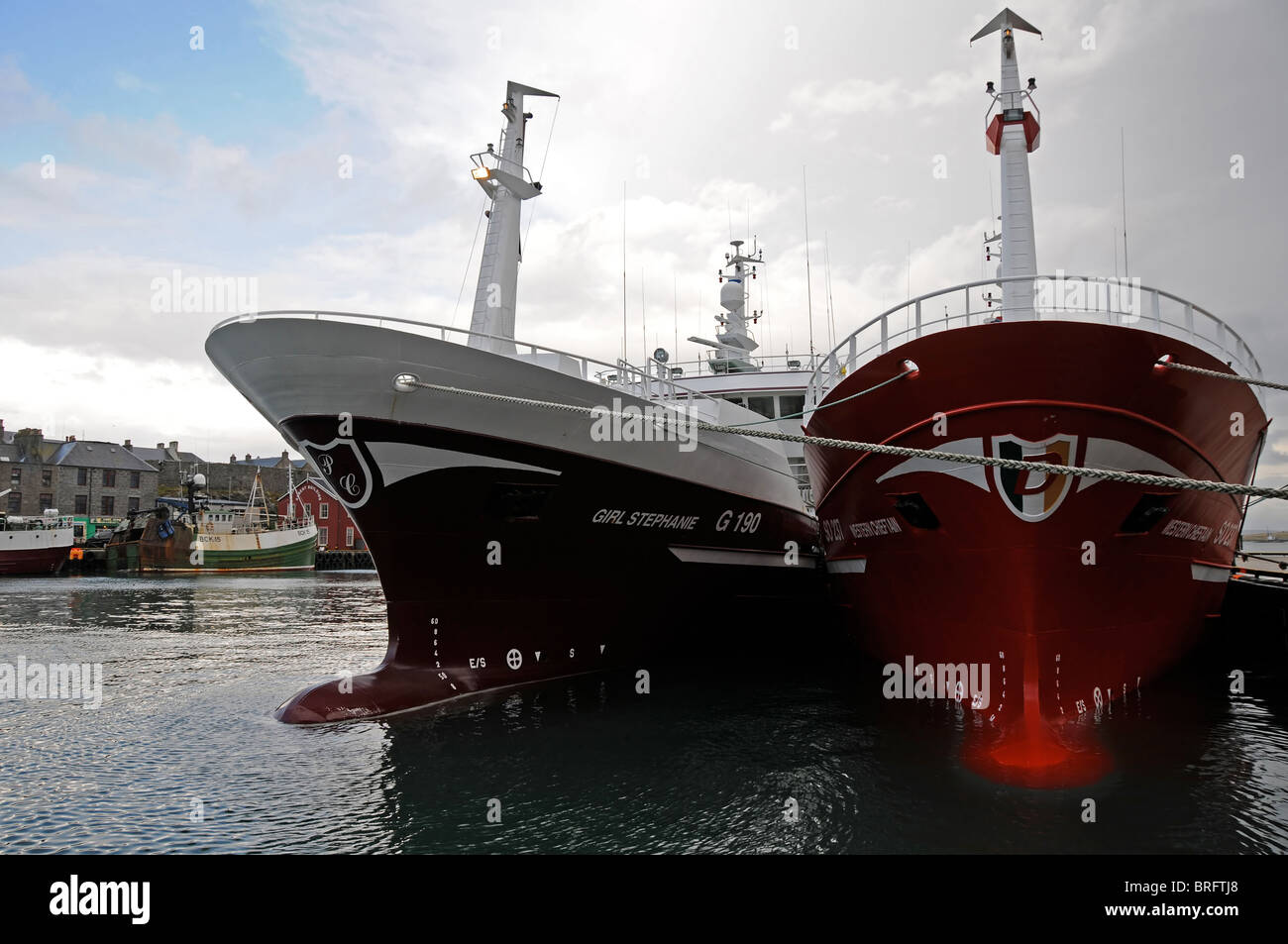 Fishing boats harbouring from the storm Stock Photo - Alamy