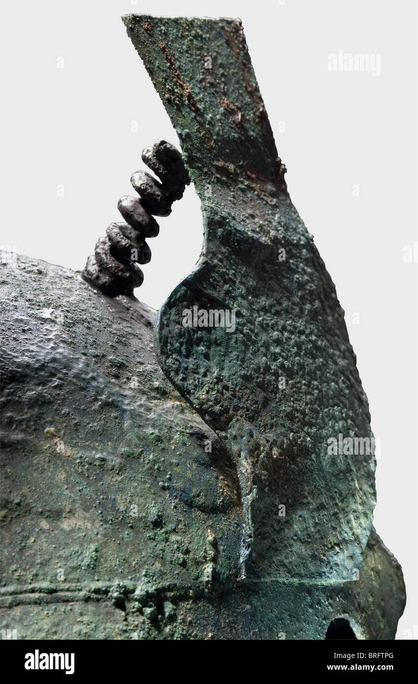 A Chalcidian helmet with wing attachments,5th/4th century B.C. Low ...