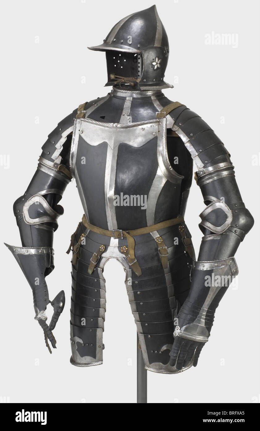A black and white three-quarter armour,Nuremberg,circa 1540/50 Burgonet ...