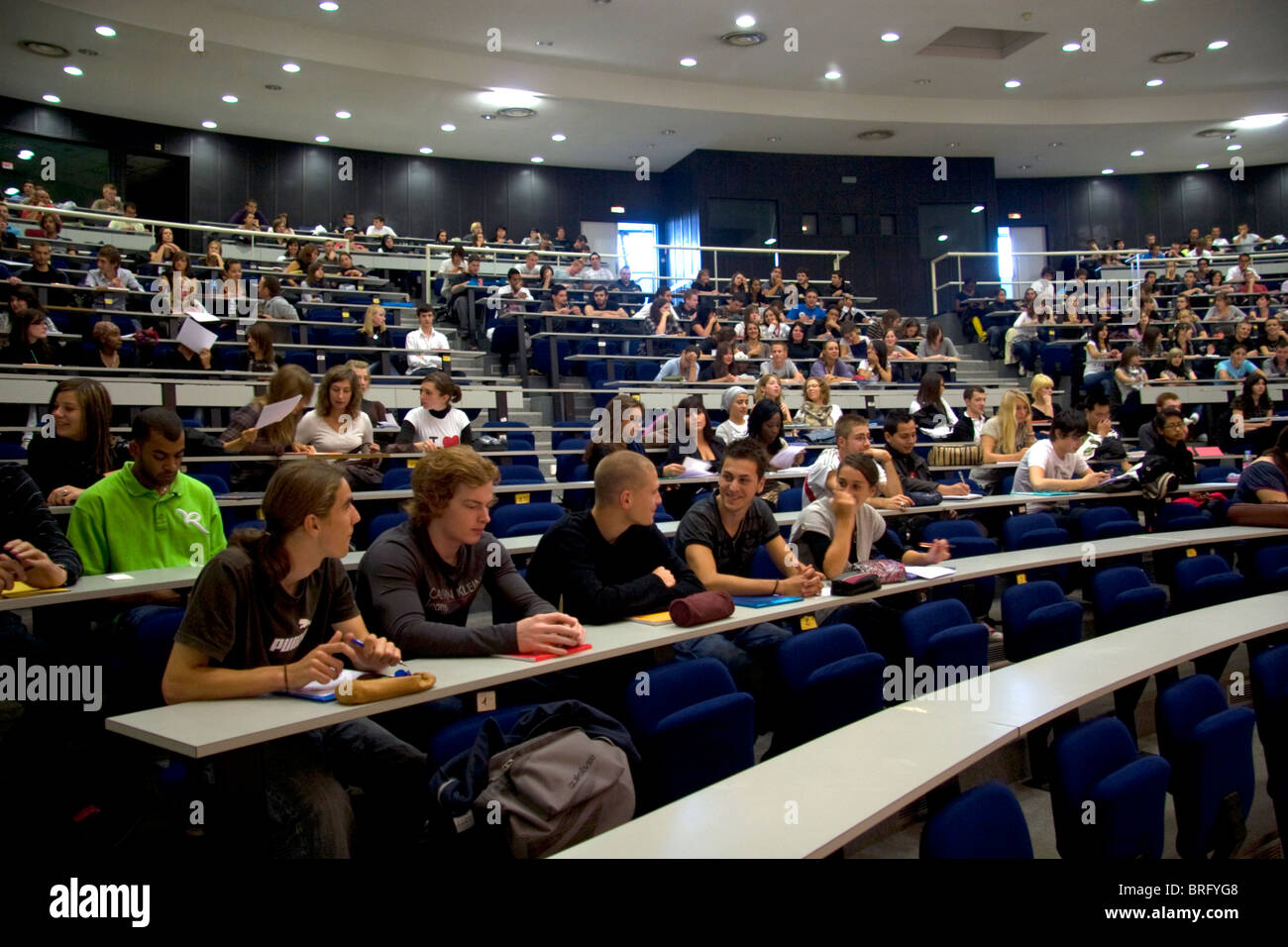 Students attend class in a lecture hall at the Paul Verlaine University ...