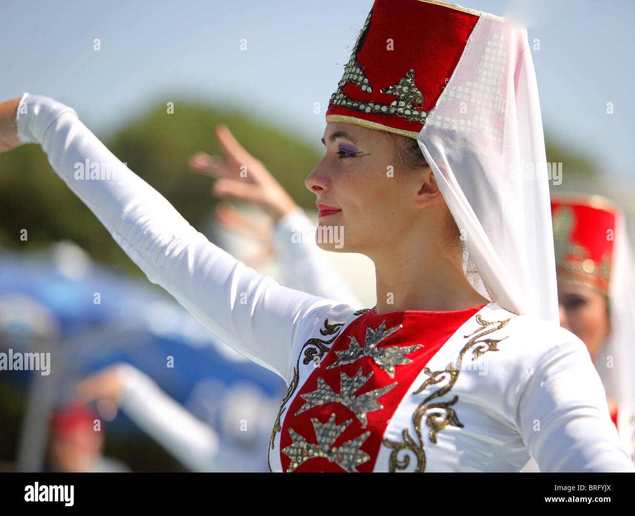 Turkish women wearing traditional clothes performing Anatolian dances ...