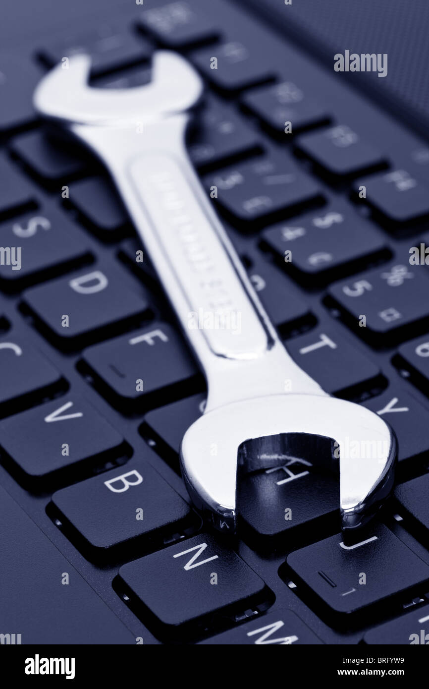 Computer Keyboard and Wrench, concept of IT Support Stock Photo - Alamy