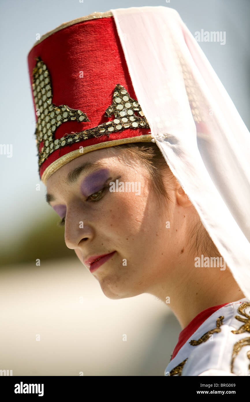Turkish women wearing traditional clothes performing Anatolian dances ...