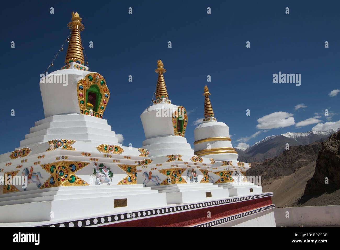 line of white chortens in the thiksey gompa Stock Photo - Alamy
