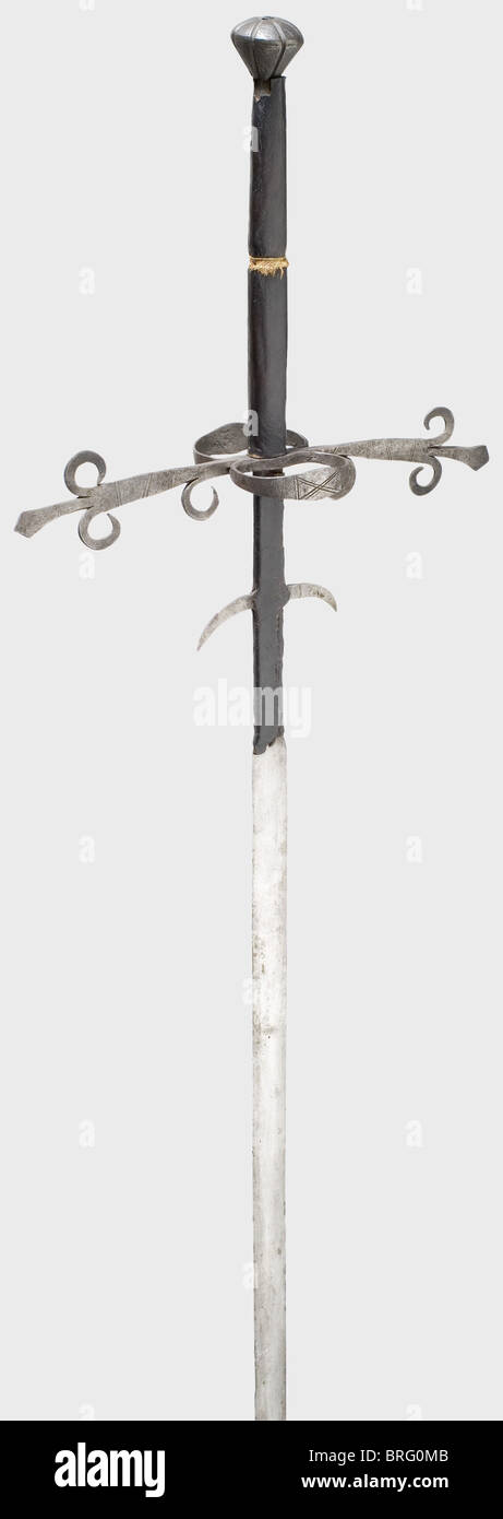 A German two-handed sword,assembled from old parts,circa 1580. Heavy ...