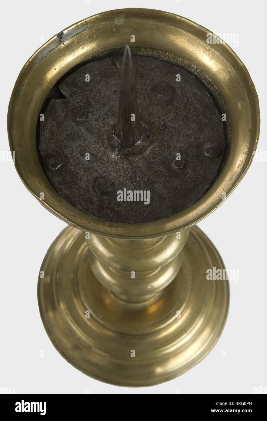 A late Gothic German pricket candlestick, circa 1500. Brass pricket ...
