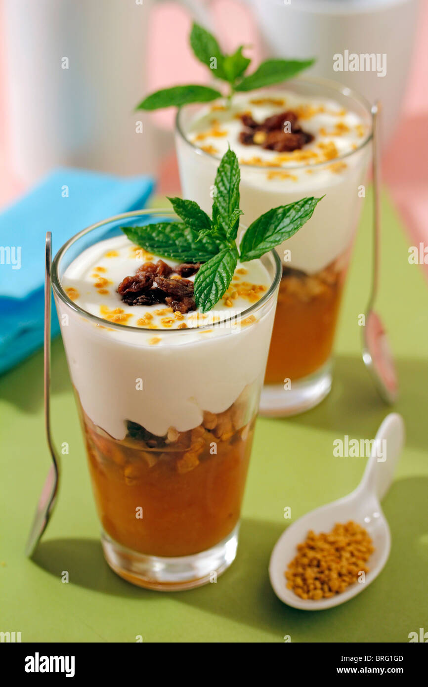 Yogurt with walnuts and pollen. Recipe available Stock Photo - Alamy