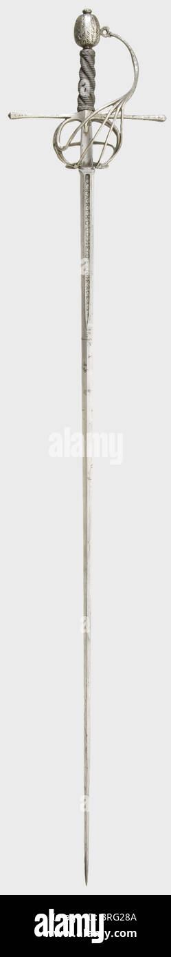 A fine Italian rapier,circa 1600. Slender thrusting blade,ridged on ...