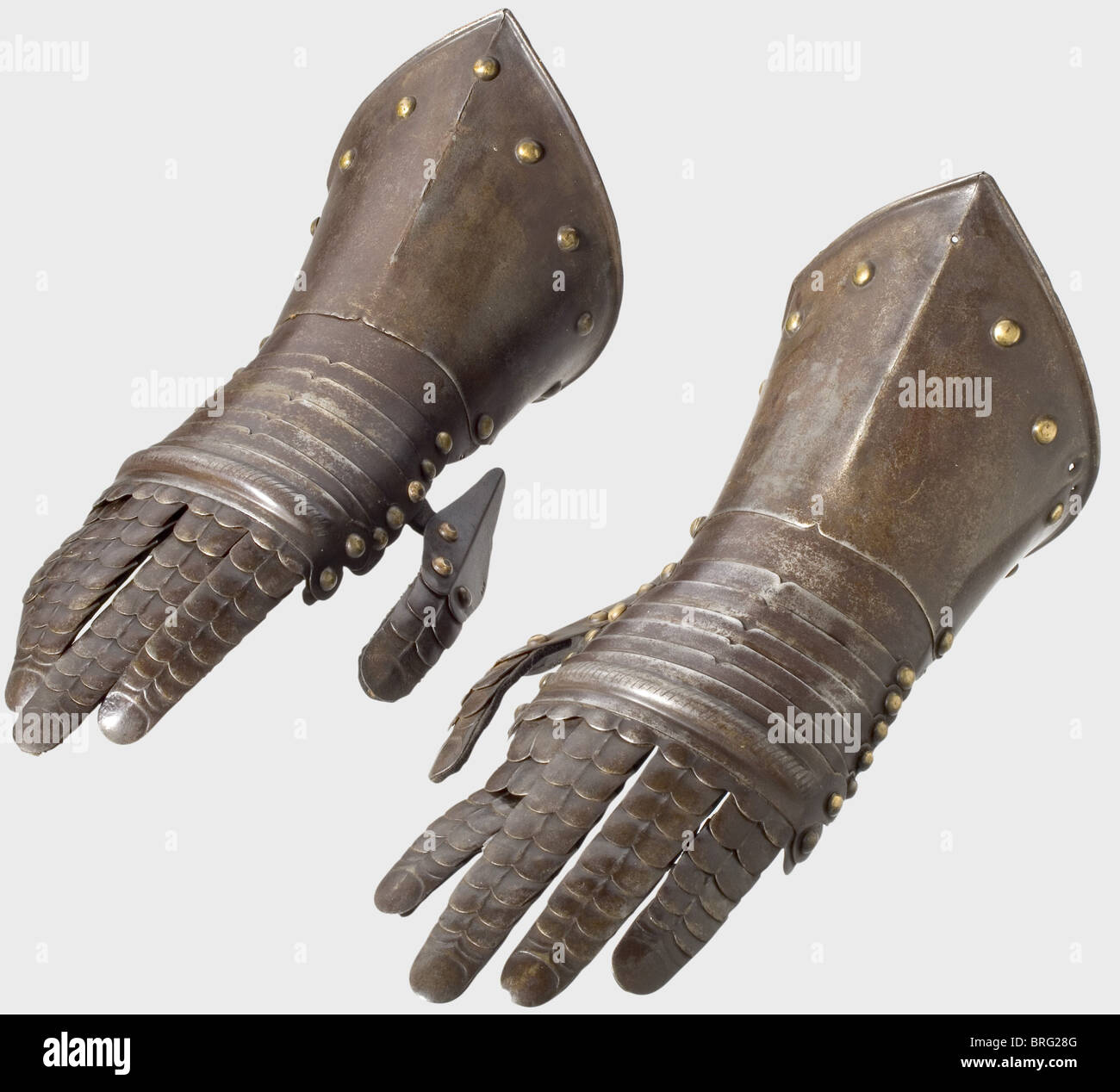 A pair of German fingered gauntlets,circa 1620.Lightly made gauntlets ...