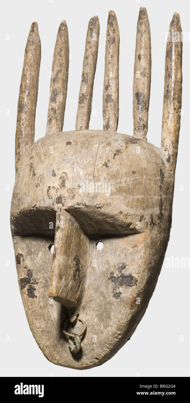 A Bambara mask,Mali,circa 1900. Strongly stylized wooden mask with ...