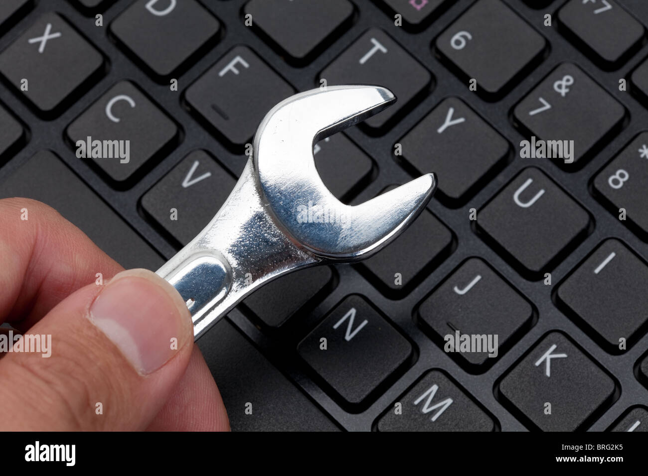 Computer Keyboard and Wrench, concept of IT Support Stock Photo - Alamy