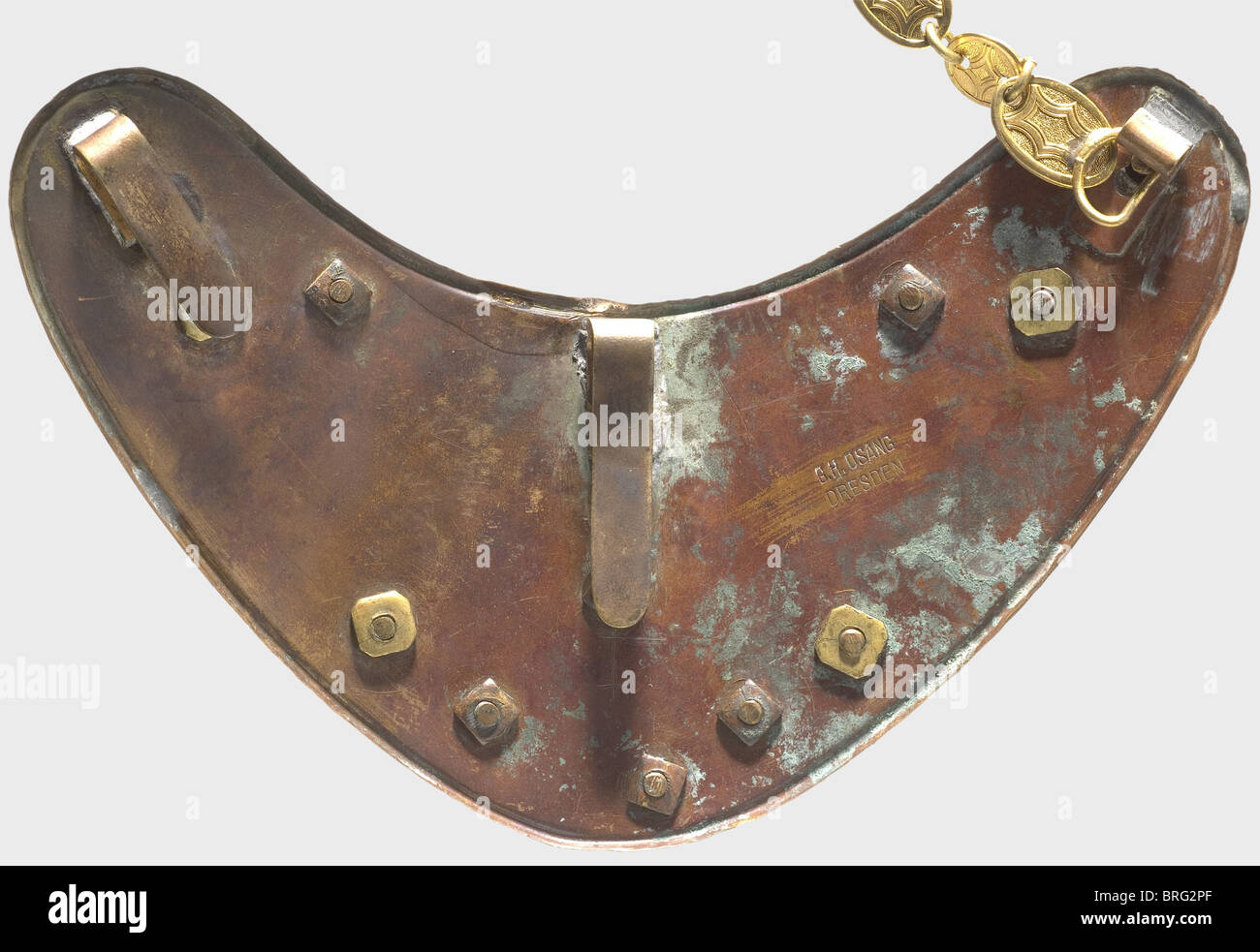 A gorget for guidon bearers.,Kidney-shaped,tombac shield bearing a ...