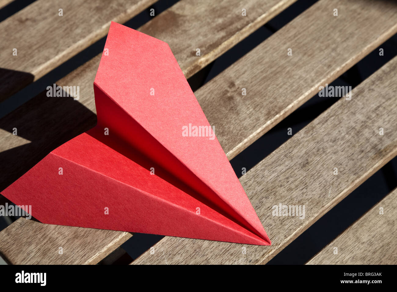 Red Paper Airplane close up Stock Photo - Alamy