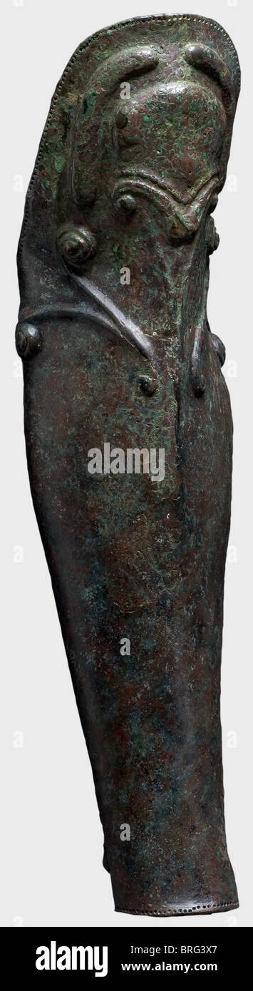 A Greek greave,6th century B.C.Right greave with numerous anatomical ...