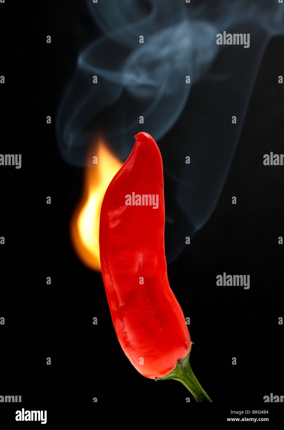 chili pepper on fire Stock Photo - Alamy