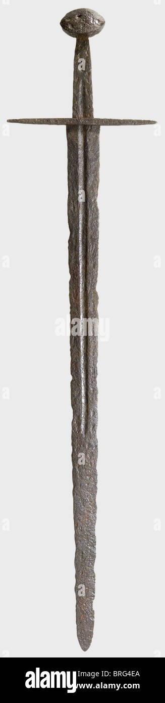 A German knightly sword,circa 1200. Double-edged blade with fullers on ...