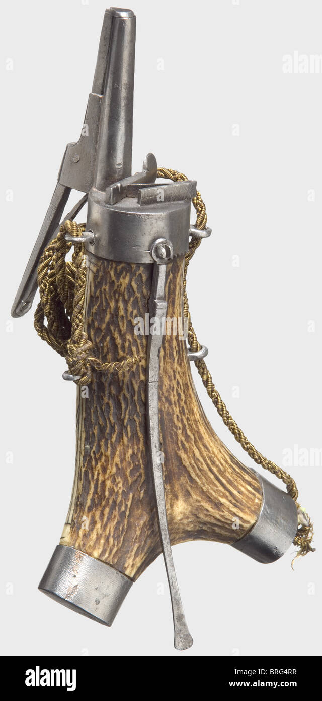 A German powder flask, circa 1580. Body of polished staghorn. The ...