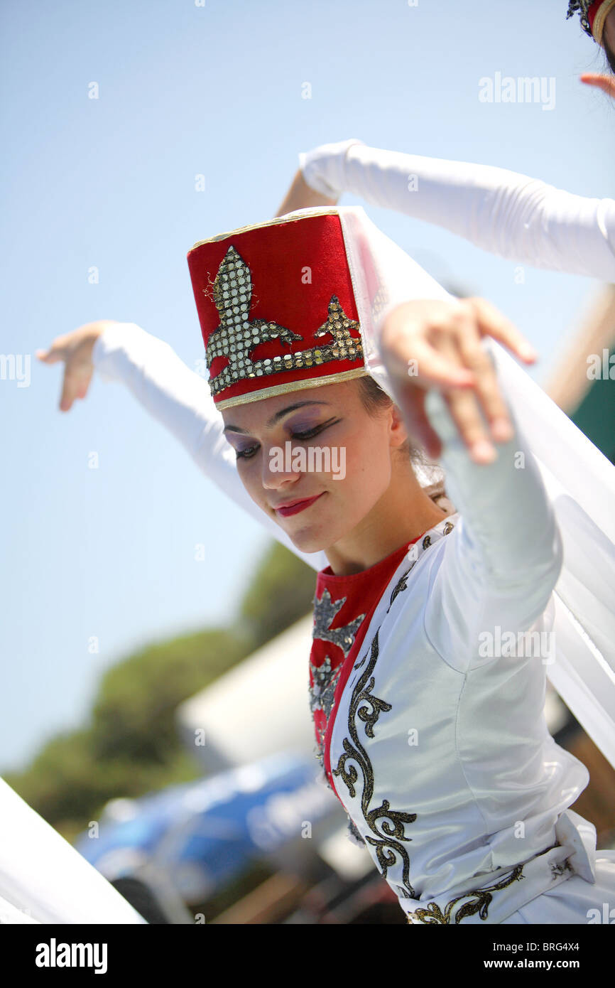 Turkish women wearing traditional clothes performing Anatolian dances ...