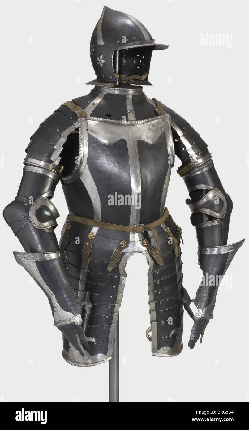 A black and white three-quarter armour,Nuremberg,circa 1540/50 Burgonet ...