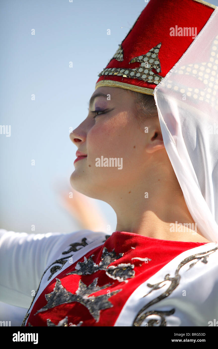 Turkish woman wearing traditional clothes performing Anatolian dances ...