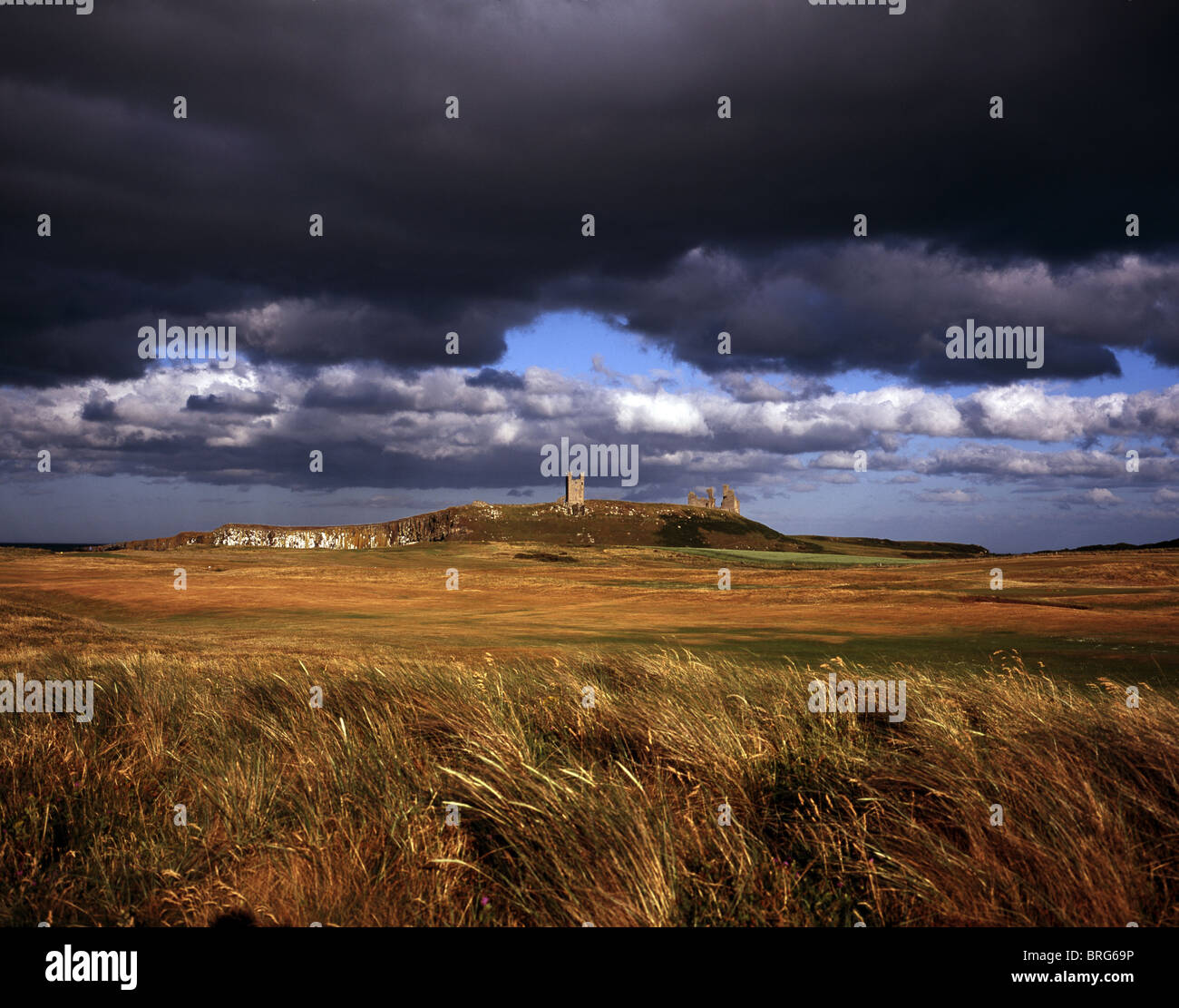Storm clouds and Dunstanburgh Castle at Embleton Bay Embleton ...