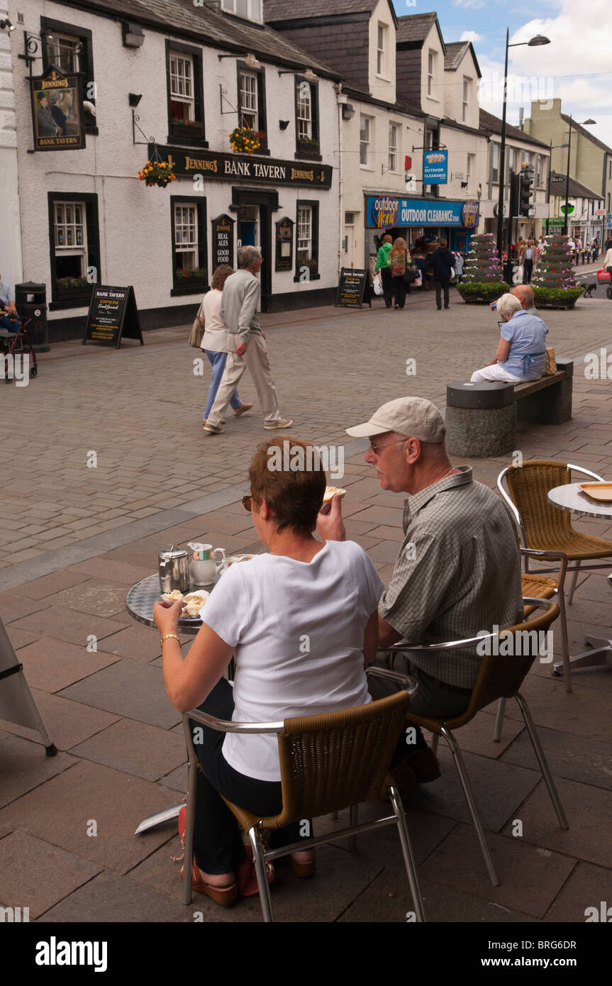 People sitting outside a cafe at Keswick , Cumbria , England , Great ...
