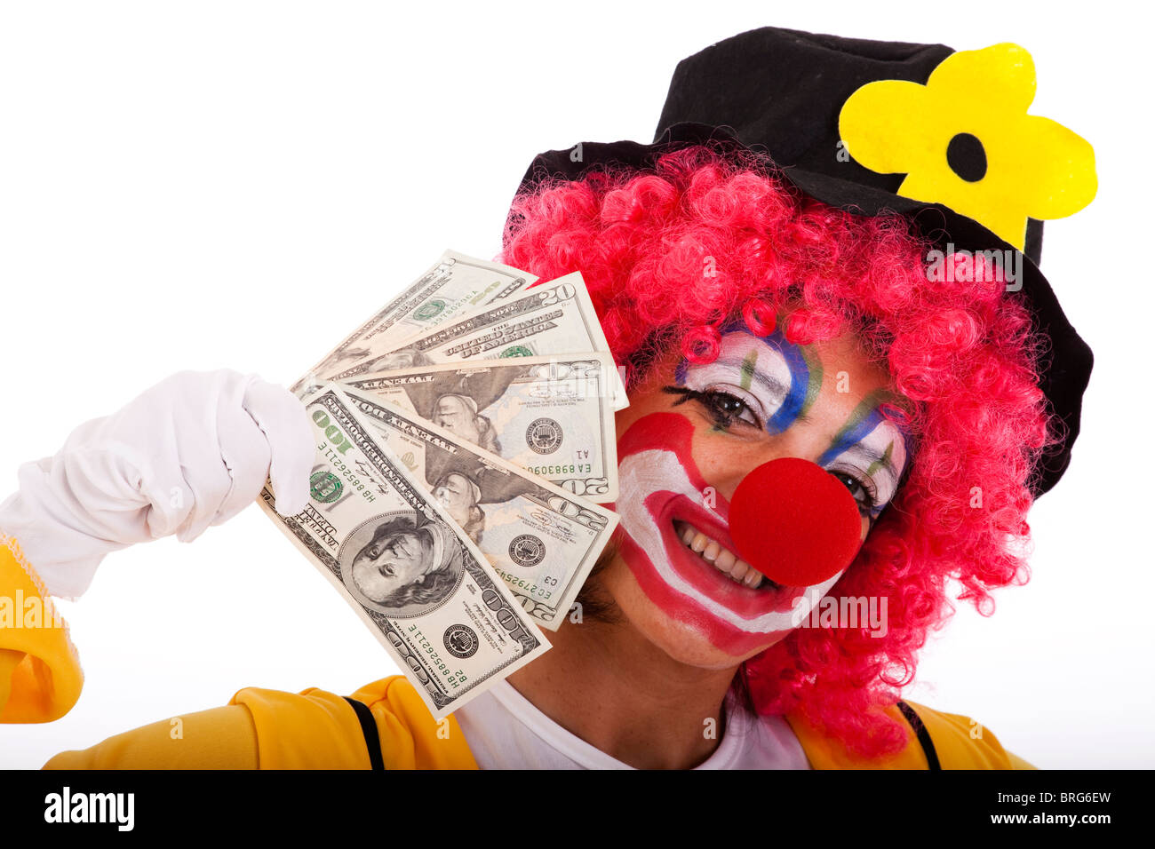 funny clown showing some dollar bills (isolated on whites Stock Photo ...